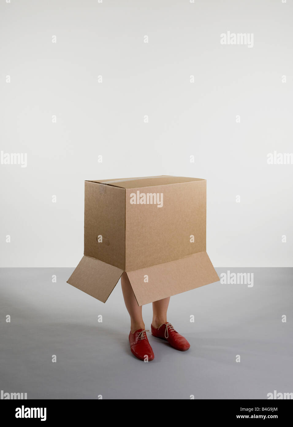 A person standing inside a box Stock Photo - Alamy