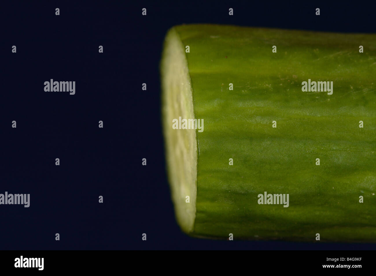 Cucumber cut in half Stock Photo - Alamy