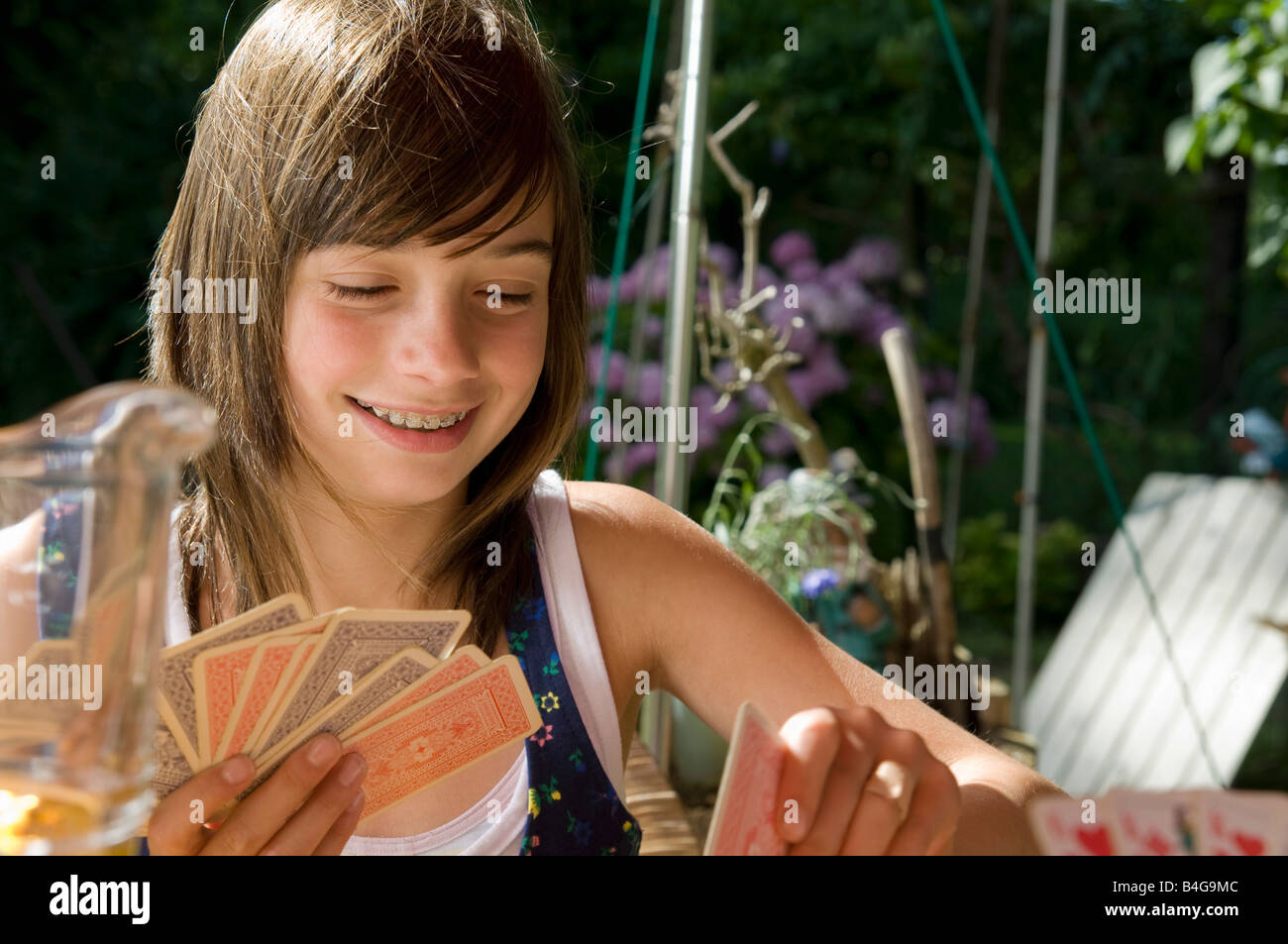 Child playing card game happy hi-res stock photography and images - Alamy