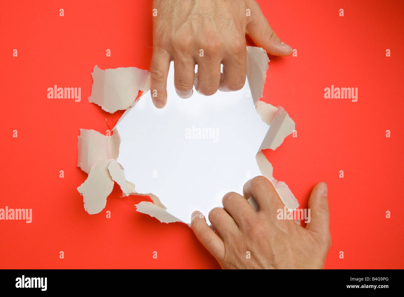 Hands breaking through wall hi-res stock photography and images - Alamy