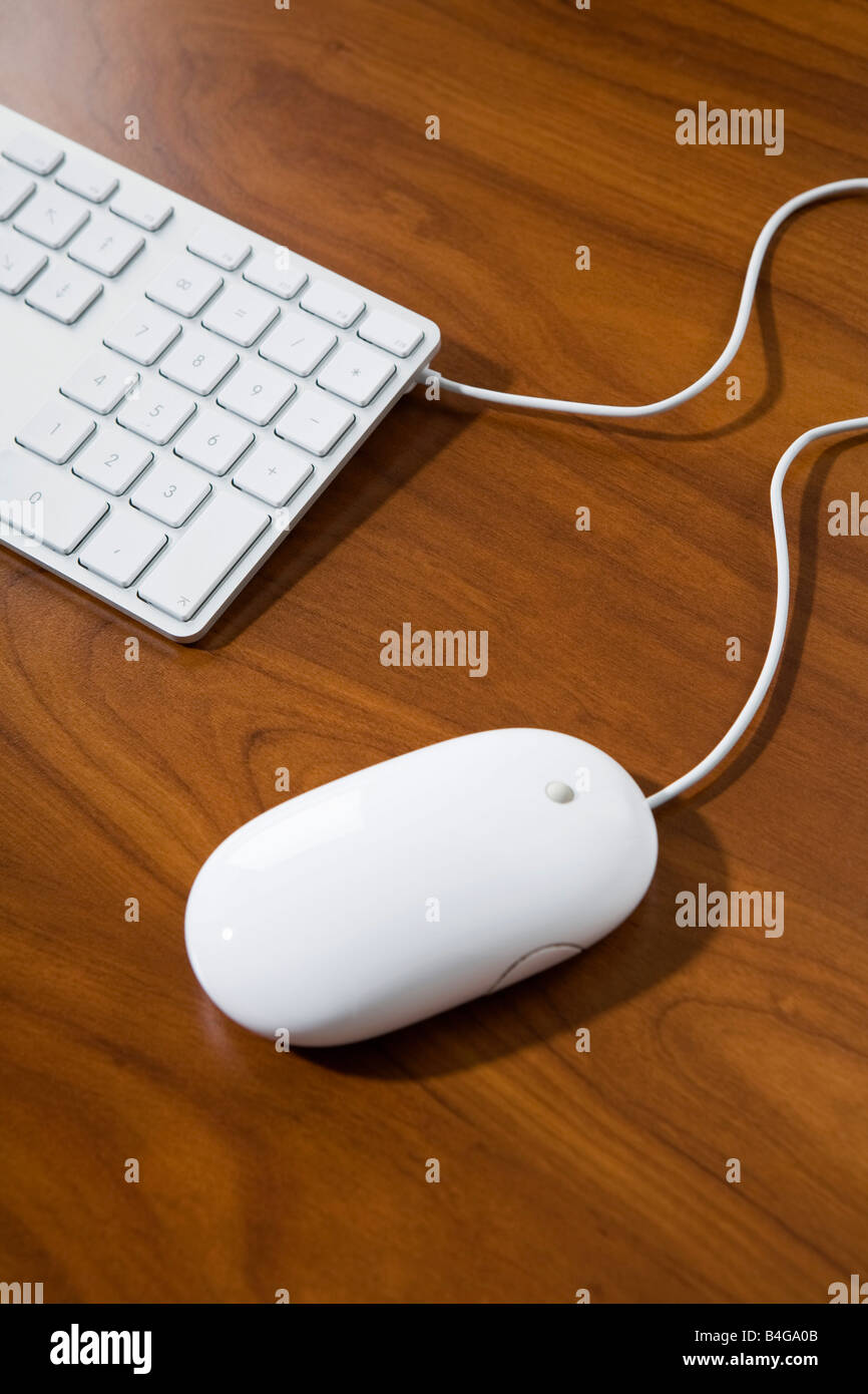 A modern computer mouse and keyboard Stock Photo - Alamy
