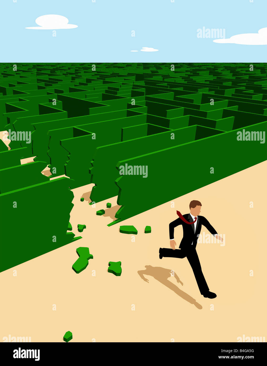 A businessman breaking through the walls of a maze Stock Photo - Alamy