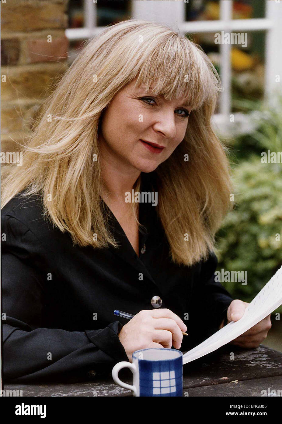 Helen Lederer comedian and actress at work on a script for her show ...