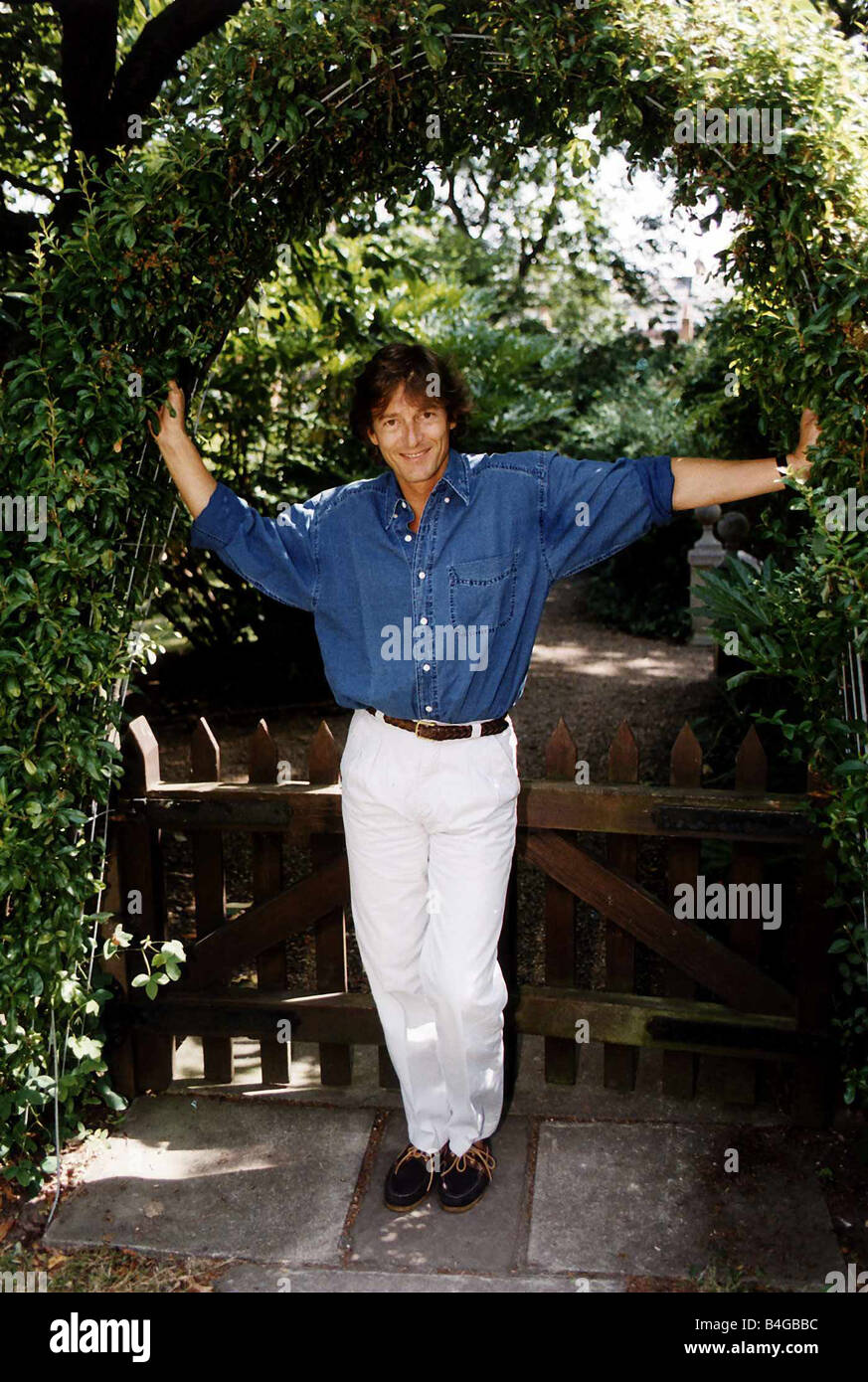 Nigel Havers actor stands in the garden at his Kensington Home Stock ...