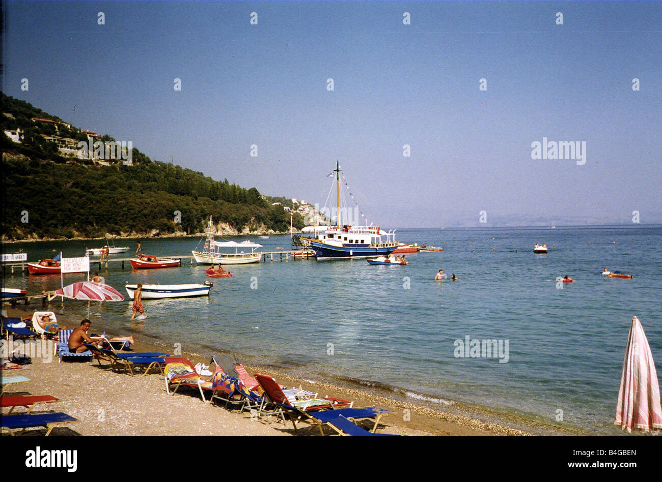 Corfu beach scene and view of shoreline Stock Photo - Alamy