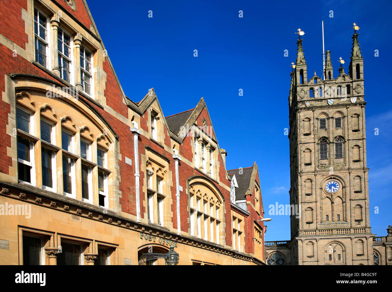 The Post Office and St Mary’s church Warwick town Warwickshire County ...