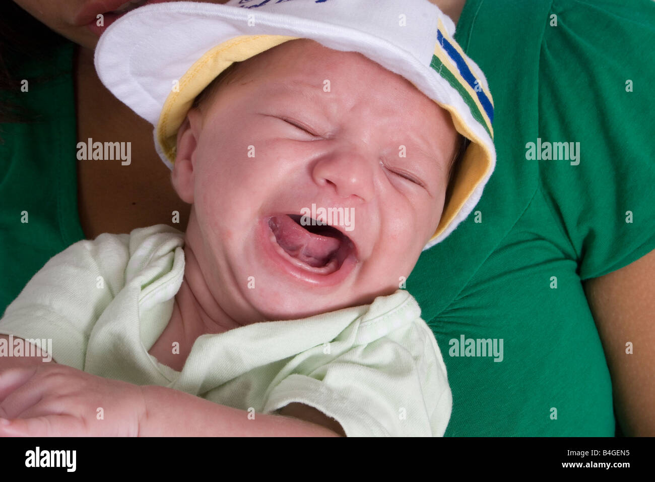 tiny baby crying Stock Photo - Alamy