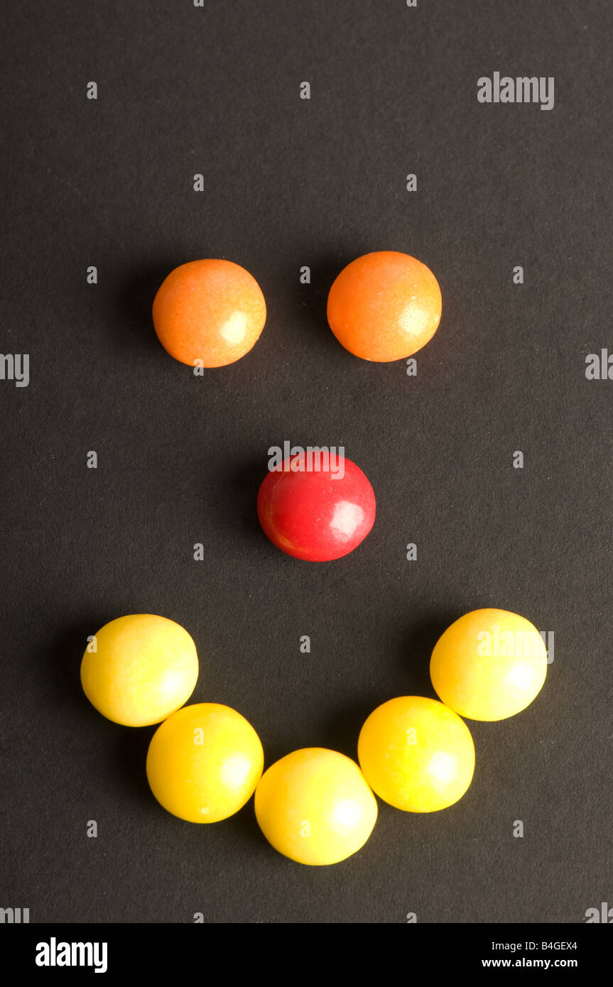 Happy Face made of Sweets Stock Photo - Alamy