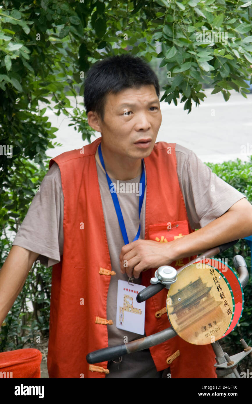 Rickshaw driver in Beijing , China Stock Photo - Alamy