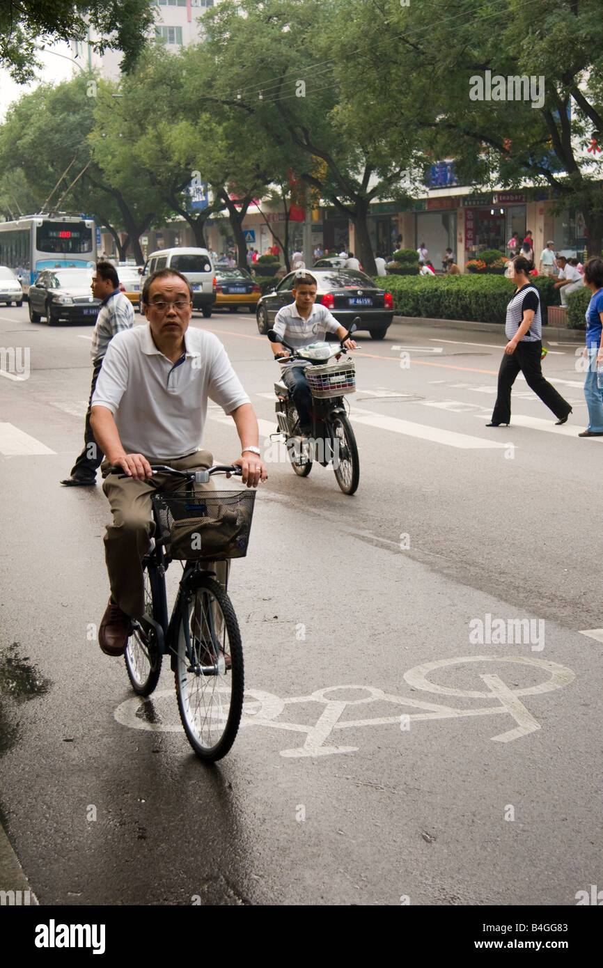 Cyclists in beijing hi-res stock photography and images - Alamy