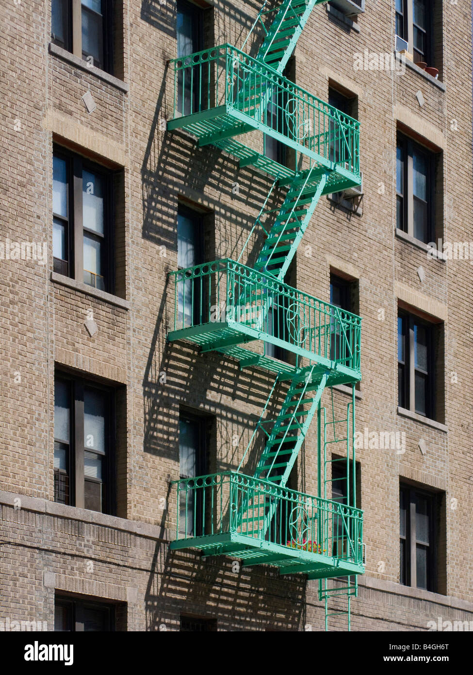 view from across street at fire escape on residential building Stock ...