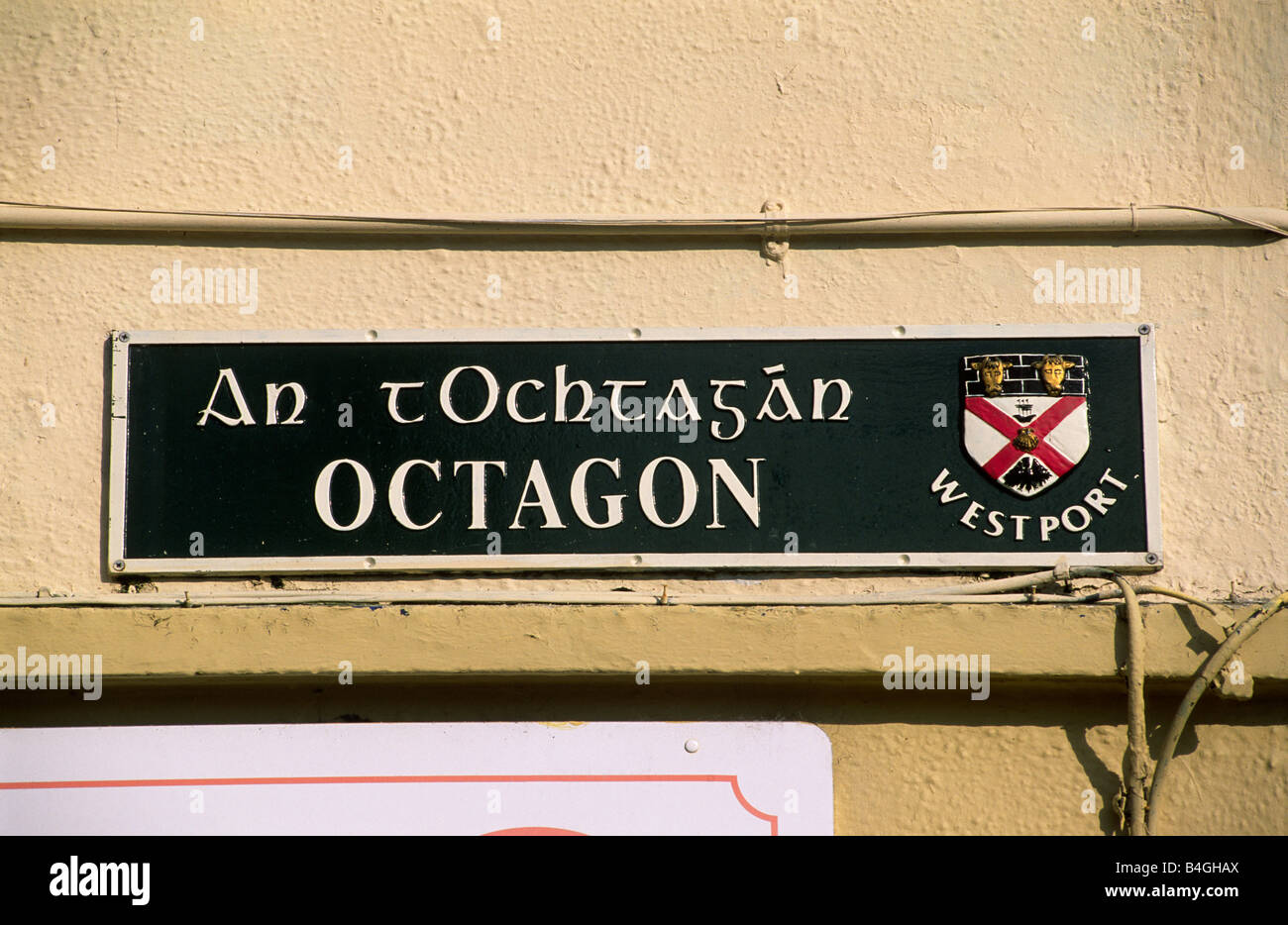 Ireland, County Mayo, Westport, Octagon square, bilingual sign close up ...
