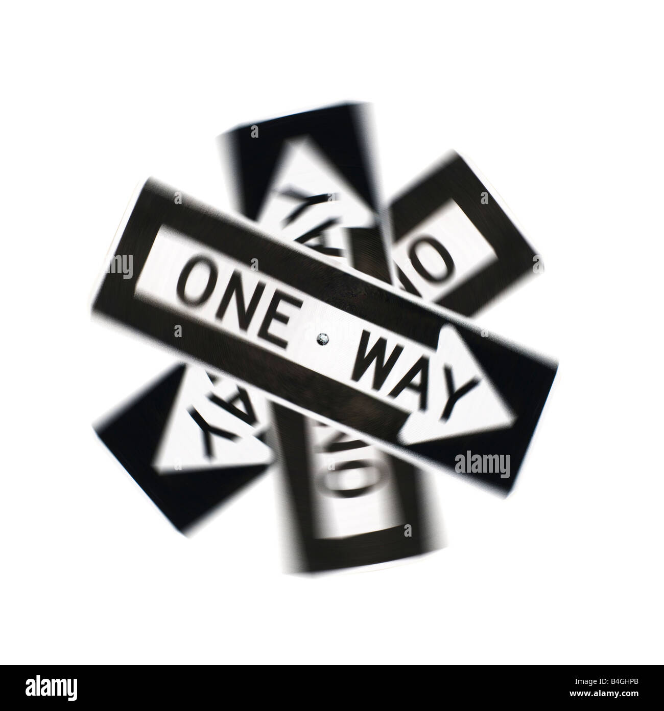 overlapping one way sign pointing in multiple directions Stock Photo ...