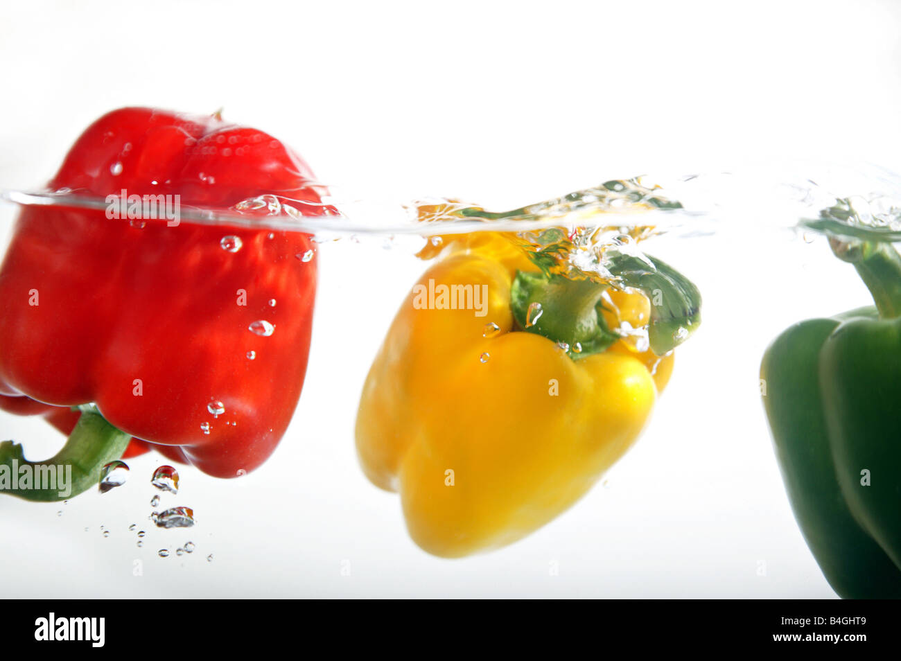 Peppers in water Stock Photo - Alamy