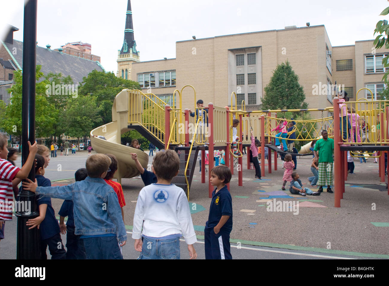 Children enjoying recess outside Chicago downtown school Stock Photo ...