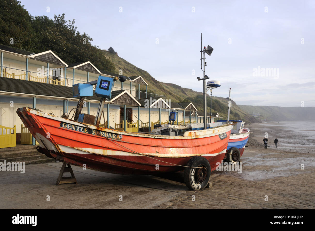 Fishing boats, early morning, on Filey seafront, Yorkshire Stock Photo ...