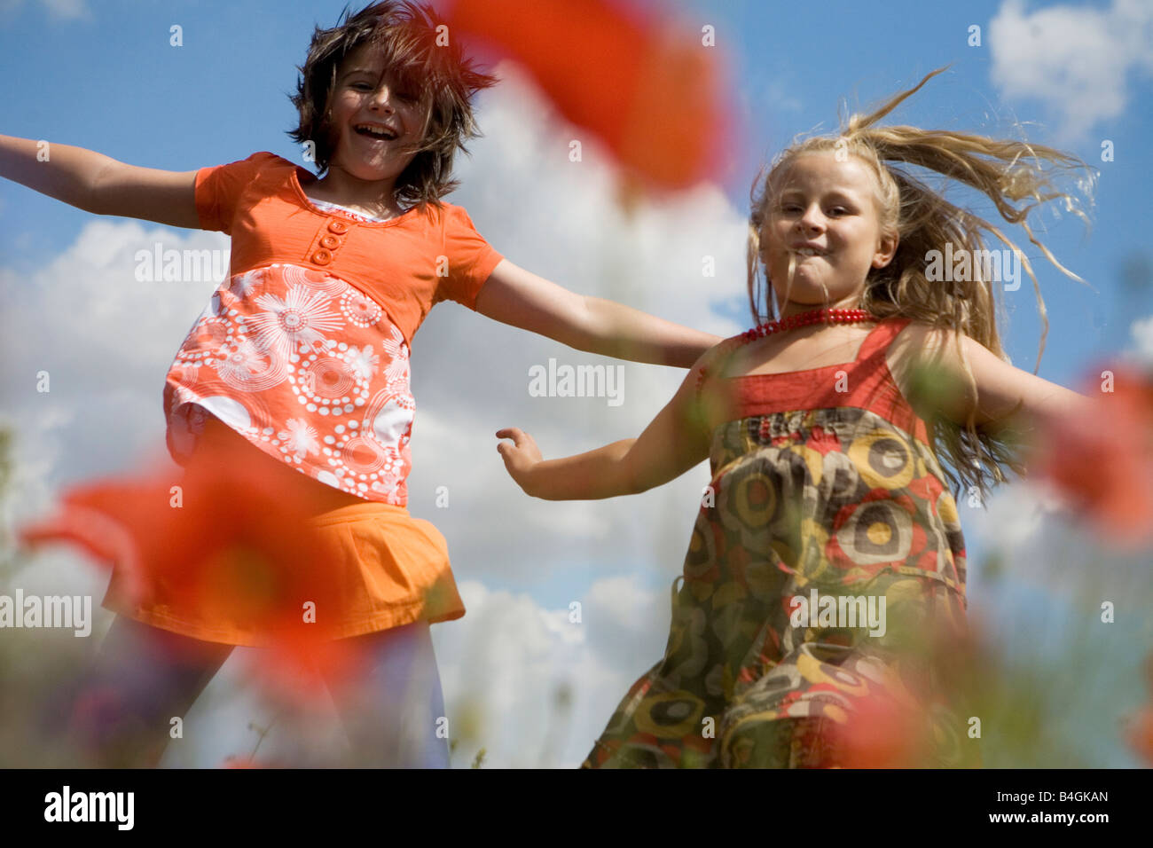 Children with poppies hi-res stock photography and images - Alamy