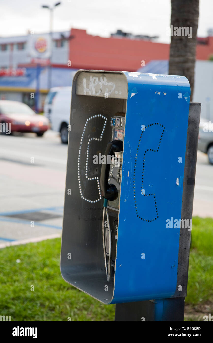 Blue public phone in street Stock Photo - Alamy