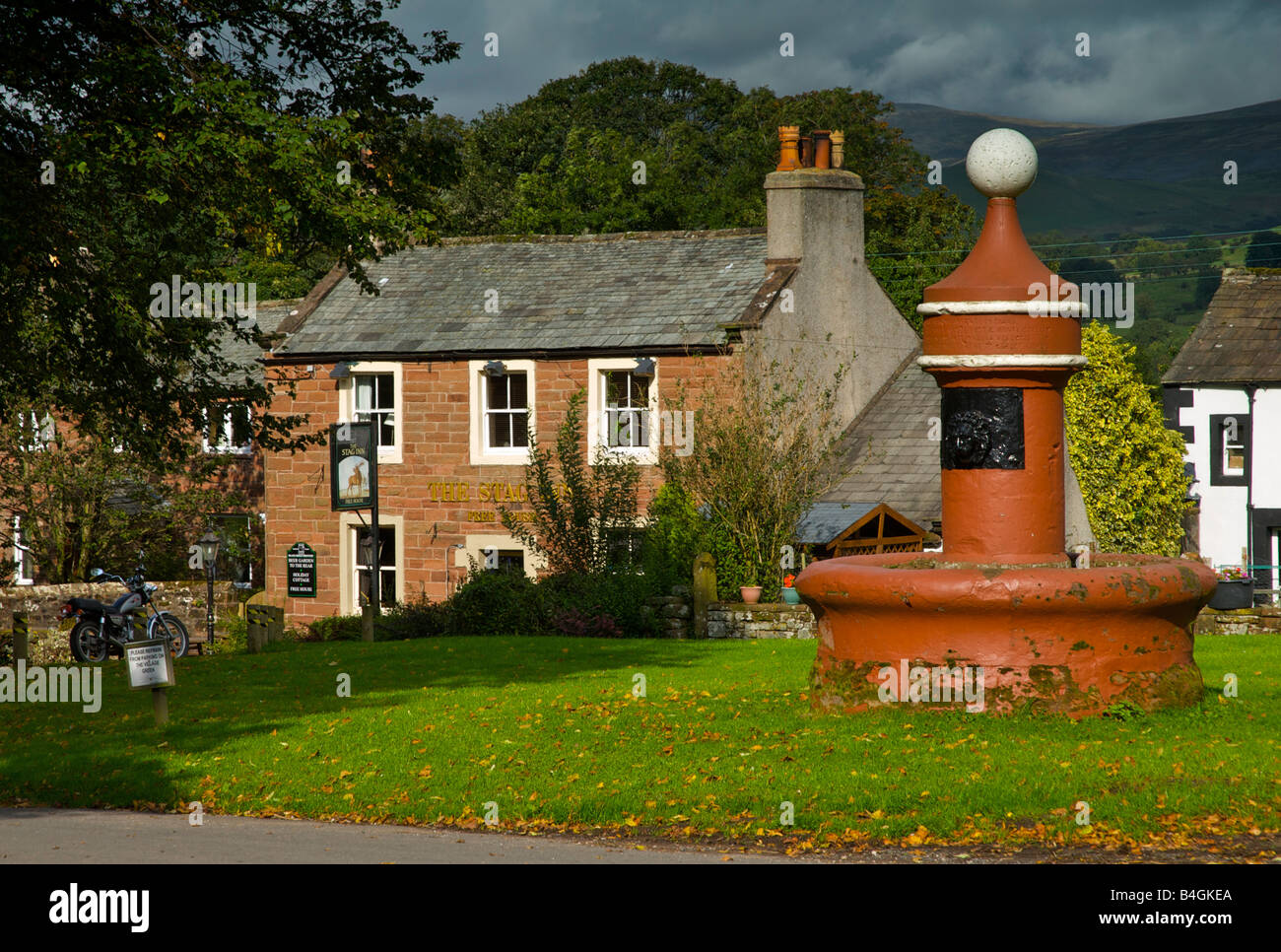 The village green at Dufton, with Stag Inn and elaborate water trough ...