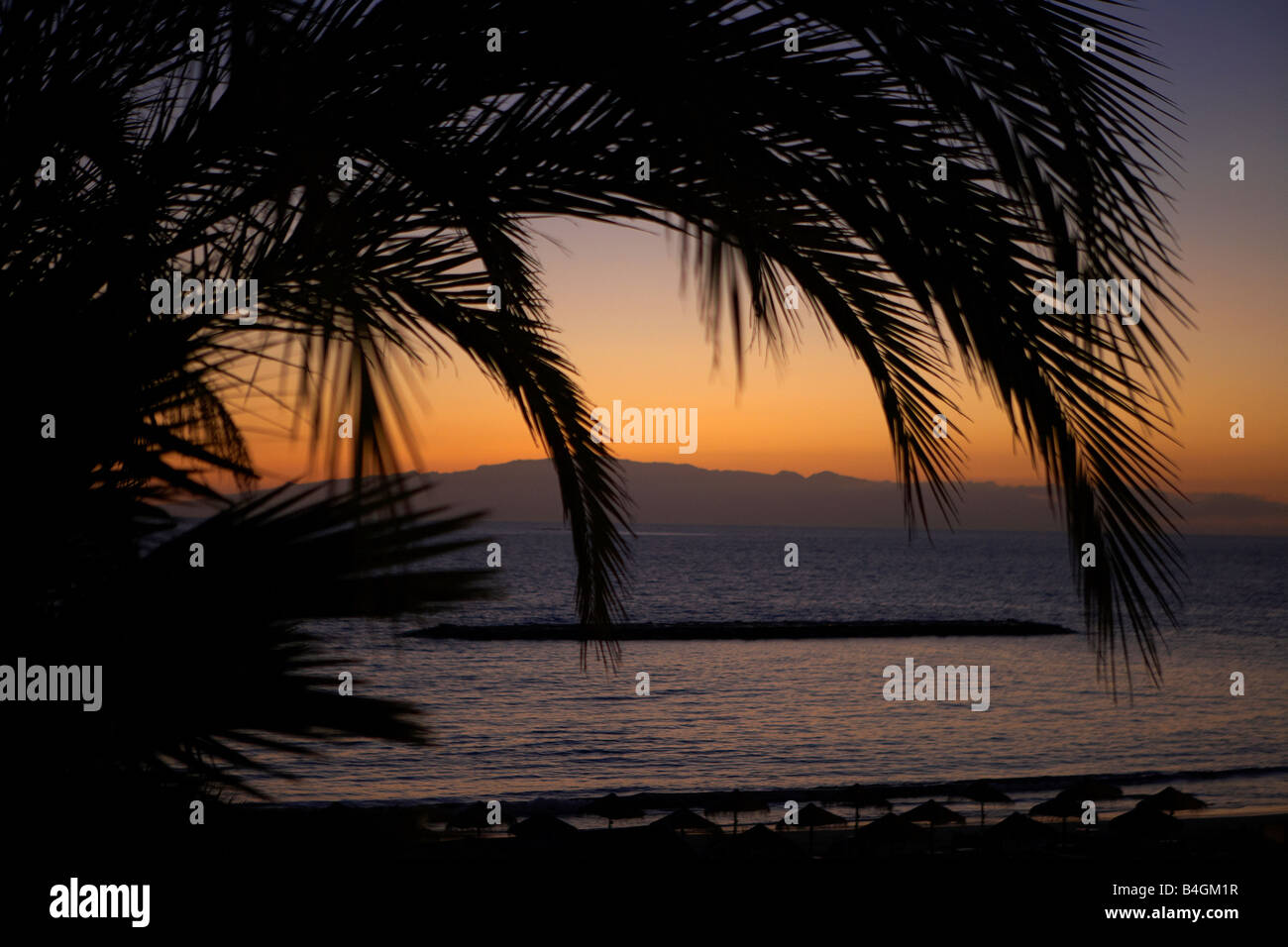 Sunset on Tenerife beach Stock Photo - Alamy