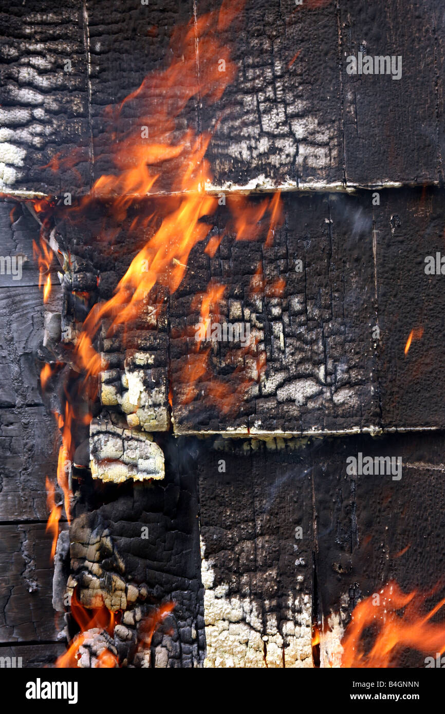 The side of a house on fire Stock Photo - Alamy