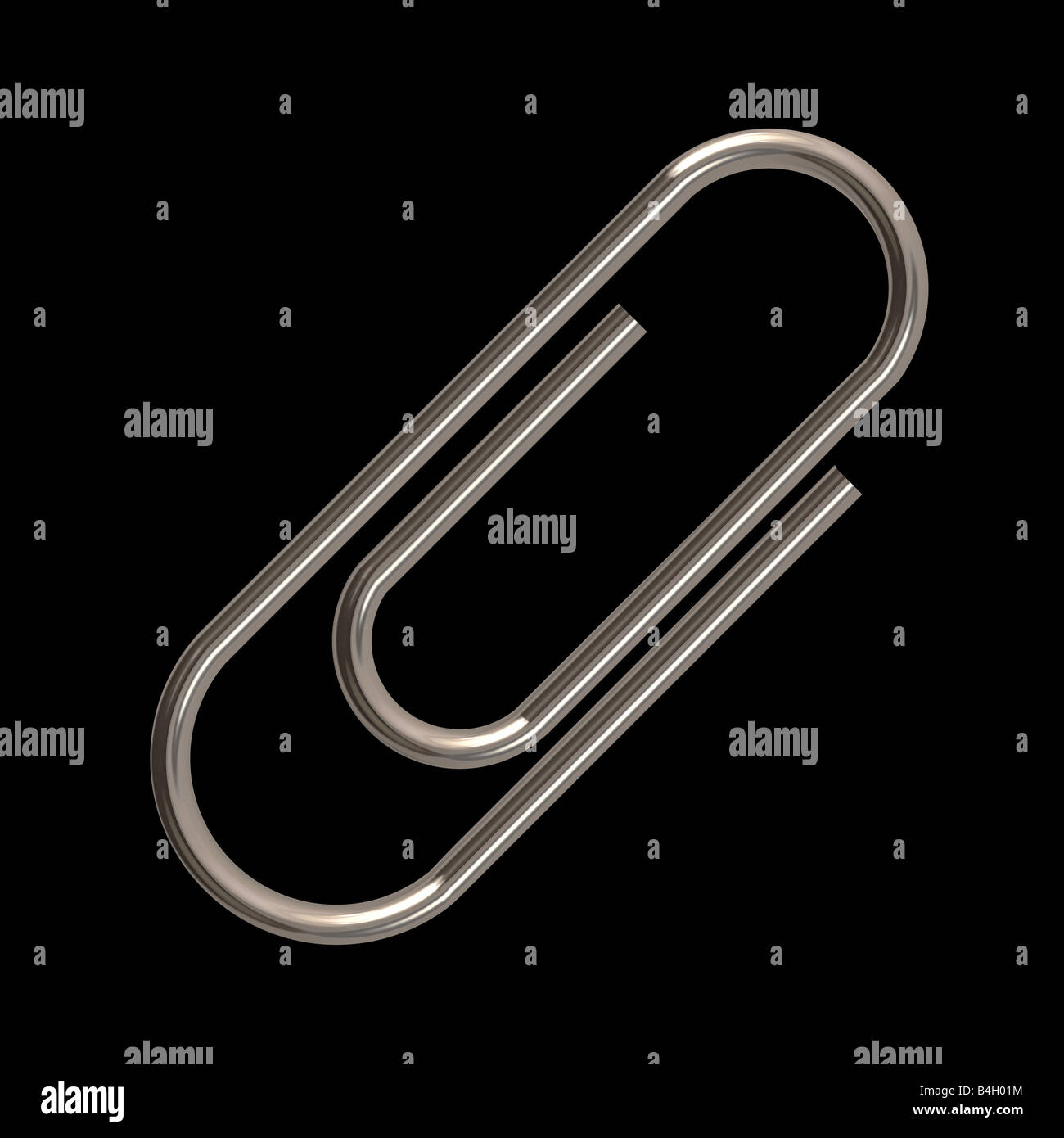 An isolated paperclip over a black background Stock Photo - Alamy