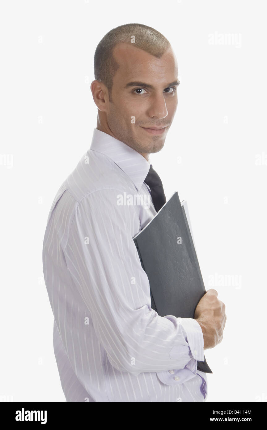 smiling young professional man posing Stock Photo - Alamy