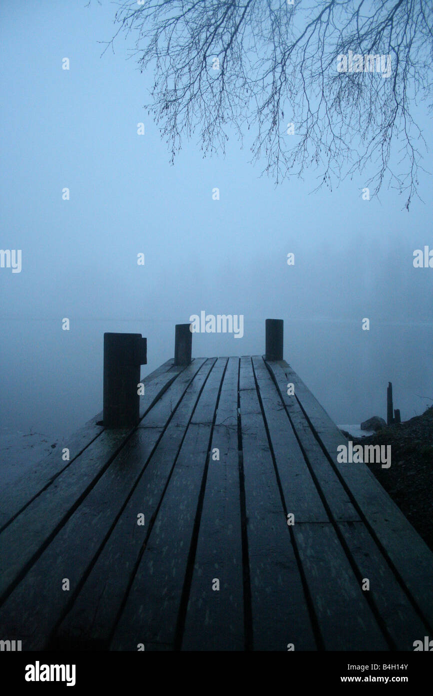 A dock in fog Stock Photo - Alamy