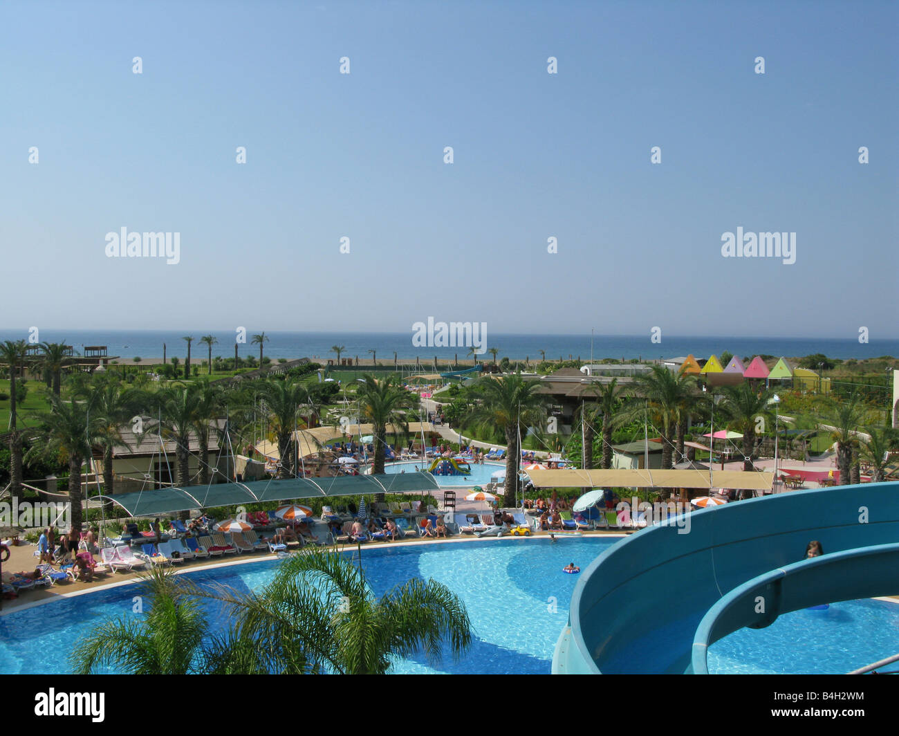 Swimming pool at holiday resort Stock Photo - Alamy