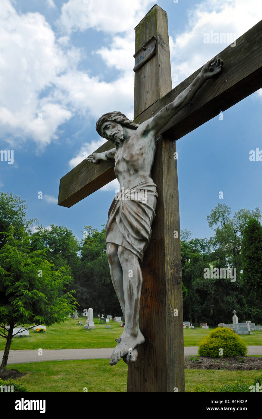 Jesus christ cross statue cemetery hi-res stock photography and images - Alamy