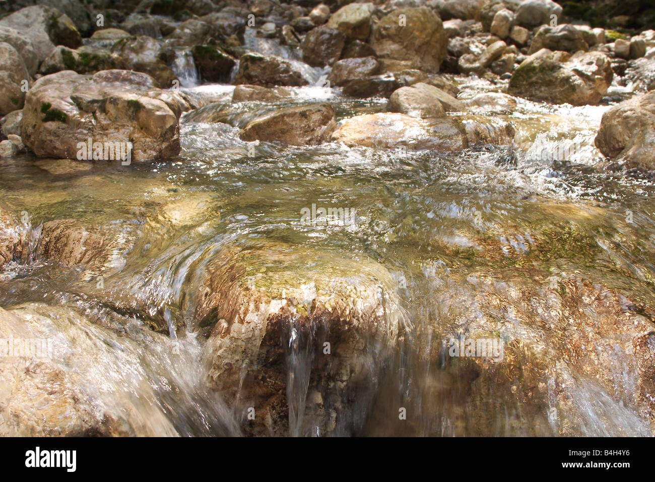 River flowing on rocks Stock Photo - Alamy