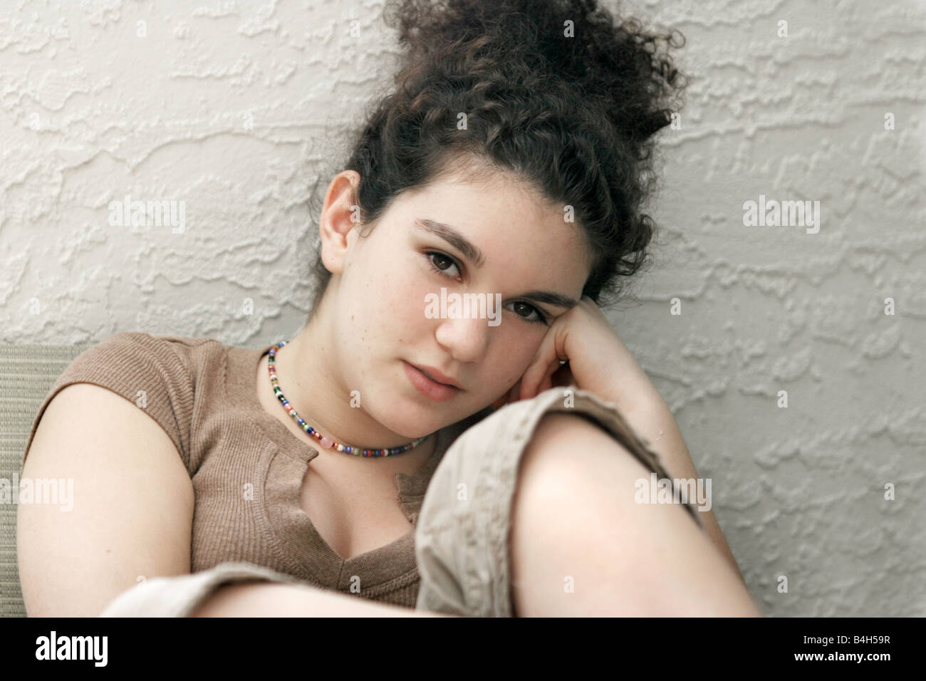 Teenage girl thinking Stock Photo - Alamy