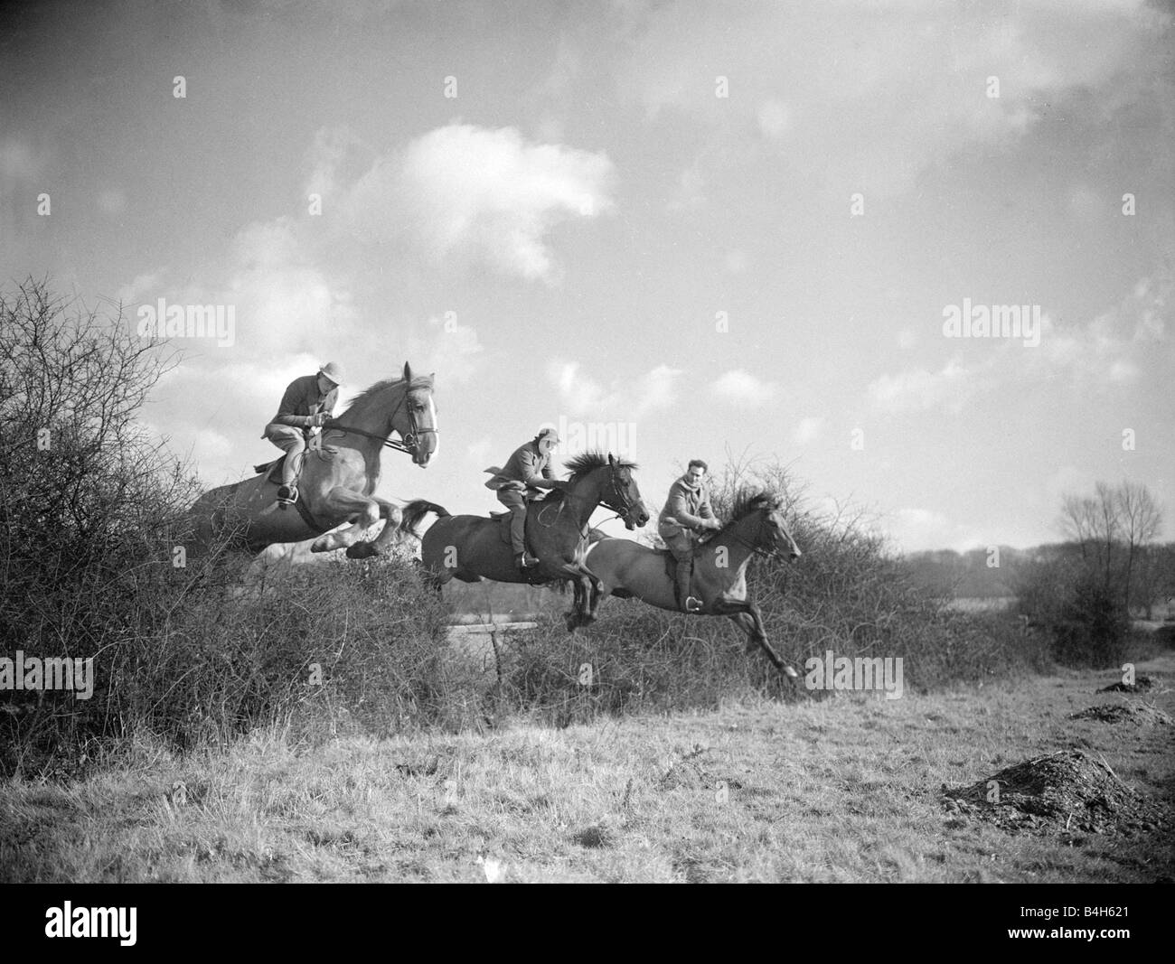 A trio of friends out for a hack through the English countryside Circa ...