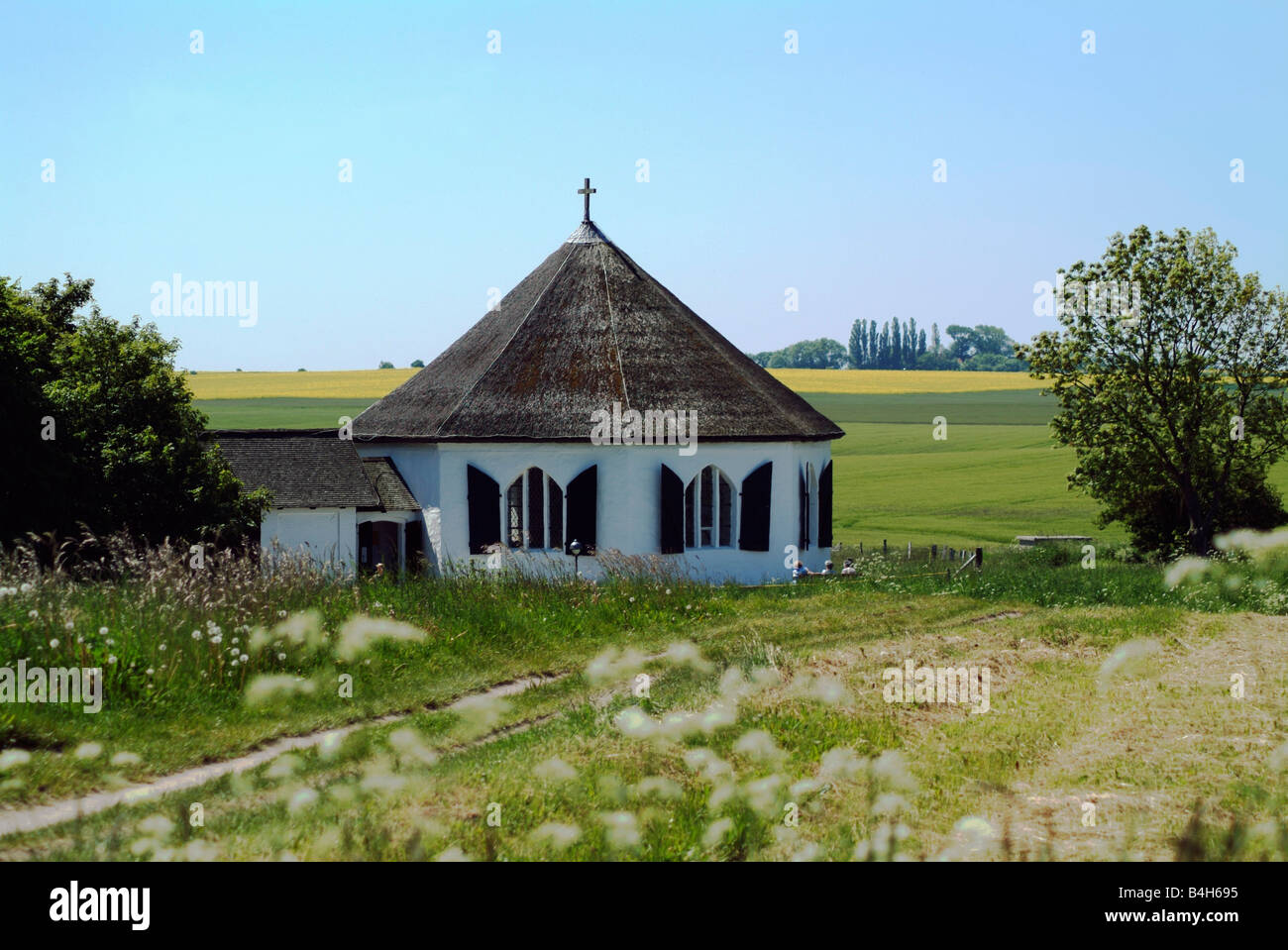Church in field Stock Photo - Alamy