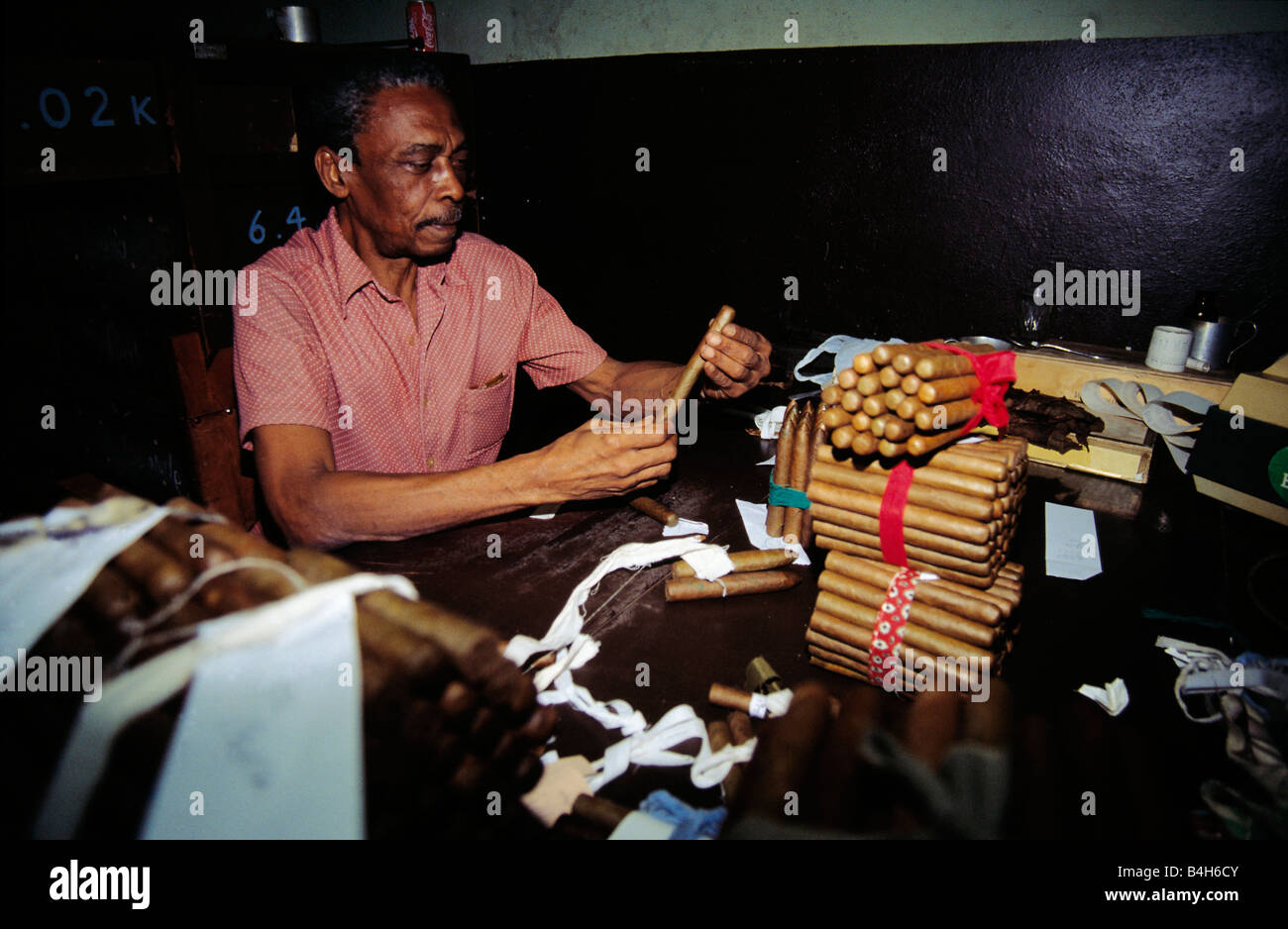 Worker making Partagas cigars in factory, Havana, Cuba Stock Photo - Alamy