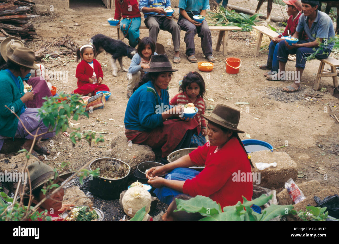 Group of people having food, Peru Stock Photo - Alamy
