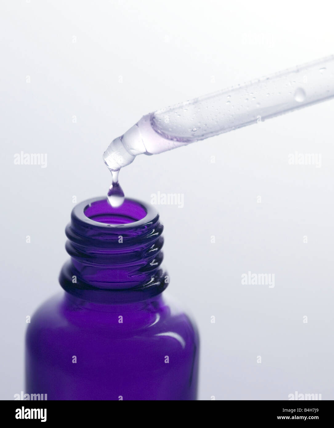 Close-up of dropper and bottle Stock Photo - Alamy