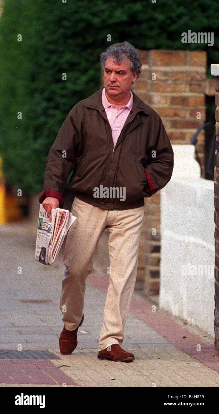 Michael Angelis Actor returns to his house with the Sunday paper Stock ...