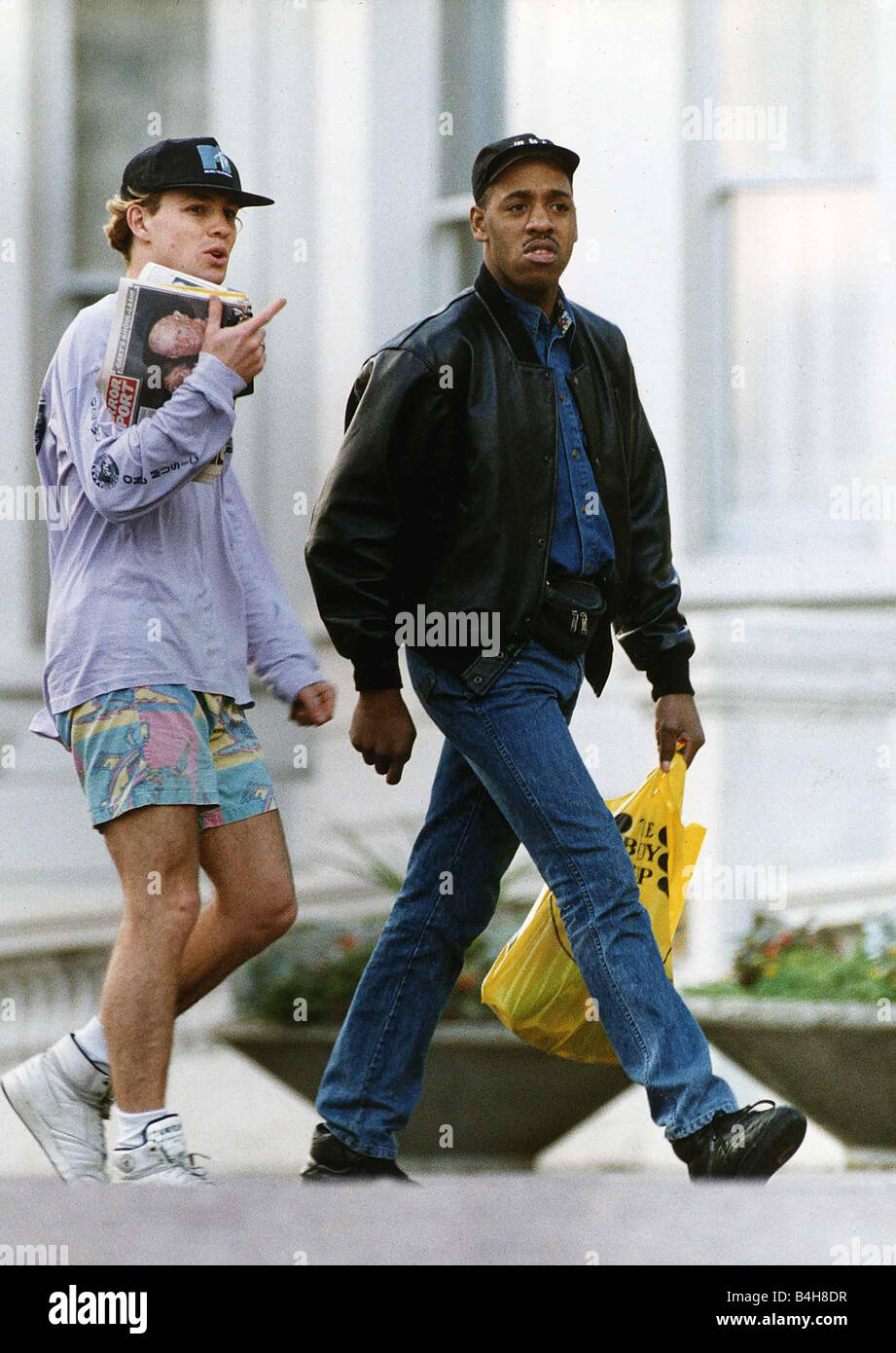 Jason Donovan Actor Singer walking along with minder Barrie Knight ...