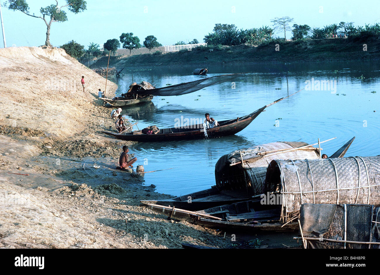 Typical river scene net fishing near Dacca Bangladesh Stock Photo - Alamy