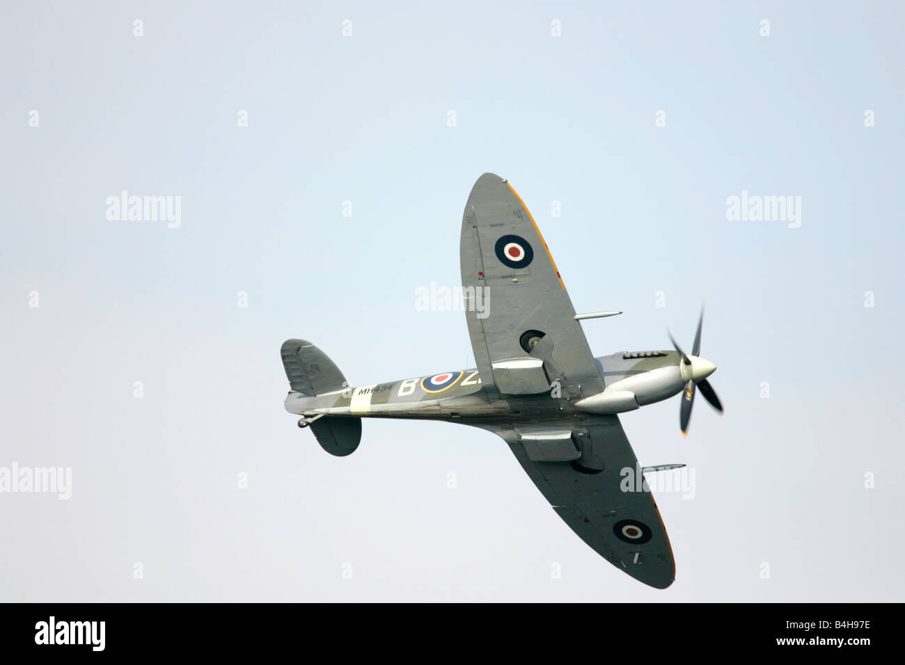 A WWII Spitfire fighter plane in flight Stock Photo - Alamy