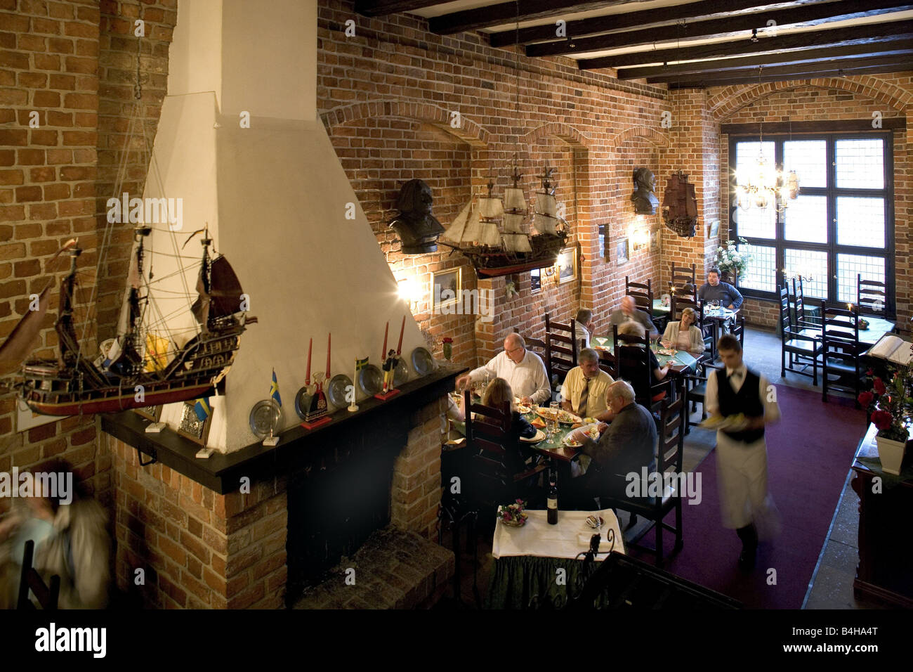 People sitting inside restaurant, Germany Stock Photo - Alamy