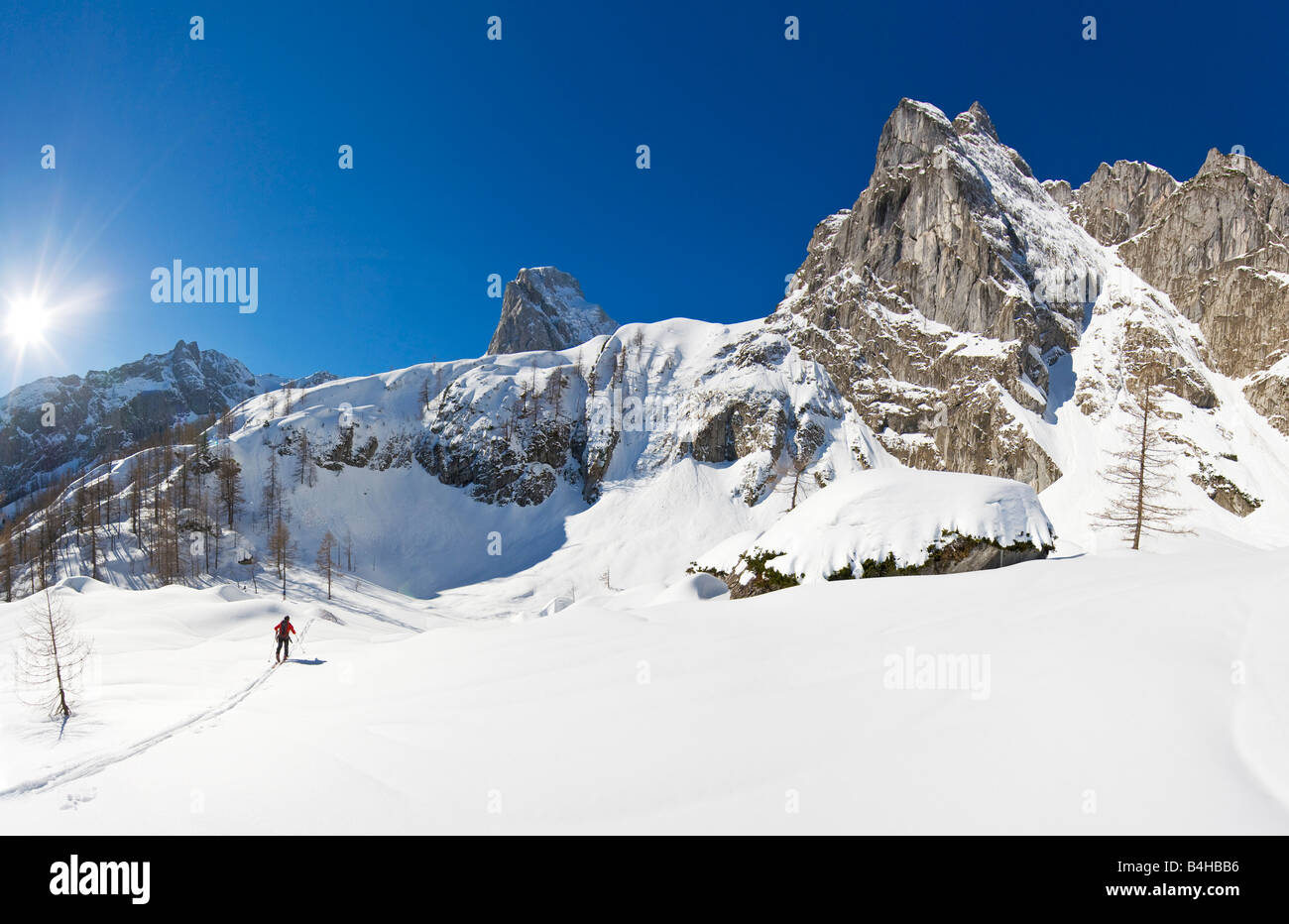 Hiker walking in snow, Tennengebirge, Austria Stock Photo - Alamy