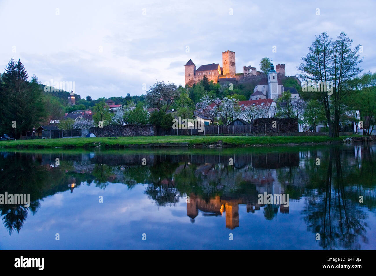 Reflection of castle and church in water, Thaya, Thayatal, Hardegg ...