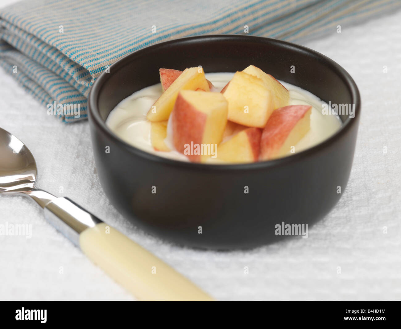 Natural Yogurt with Chopped Apple Stock Photo - Alamy