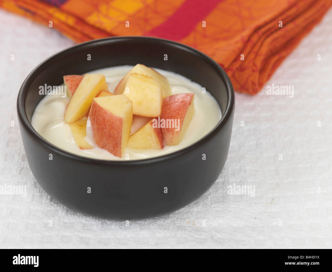Natural Yogurt with Chopped Apple Stock Photo - Alamy