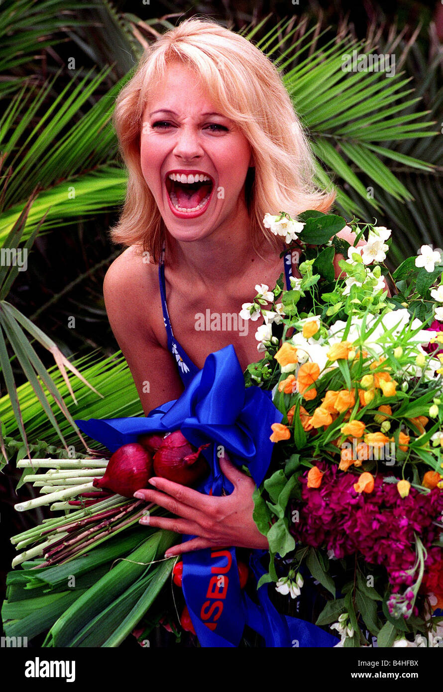 Actress Miranda Burrows at Chelsea flower show 1997 holding boquet of ...