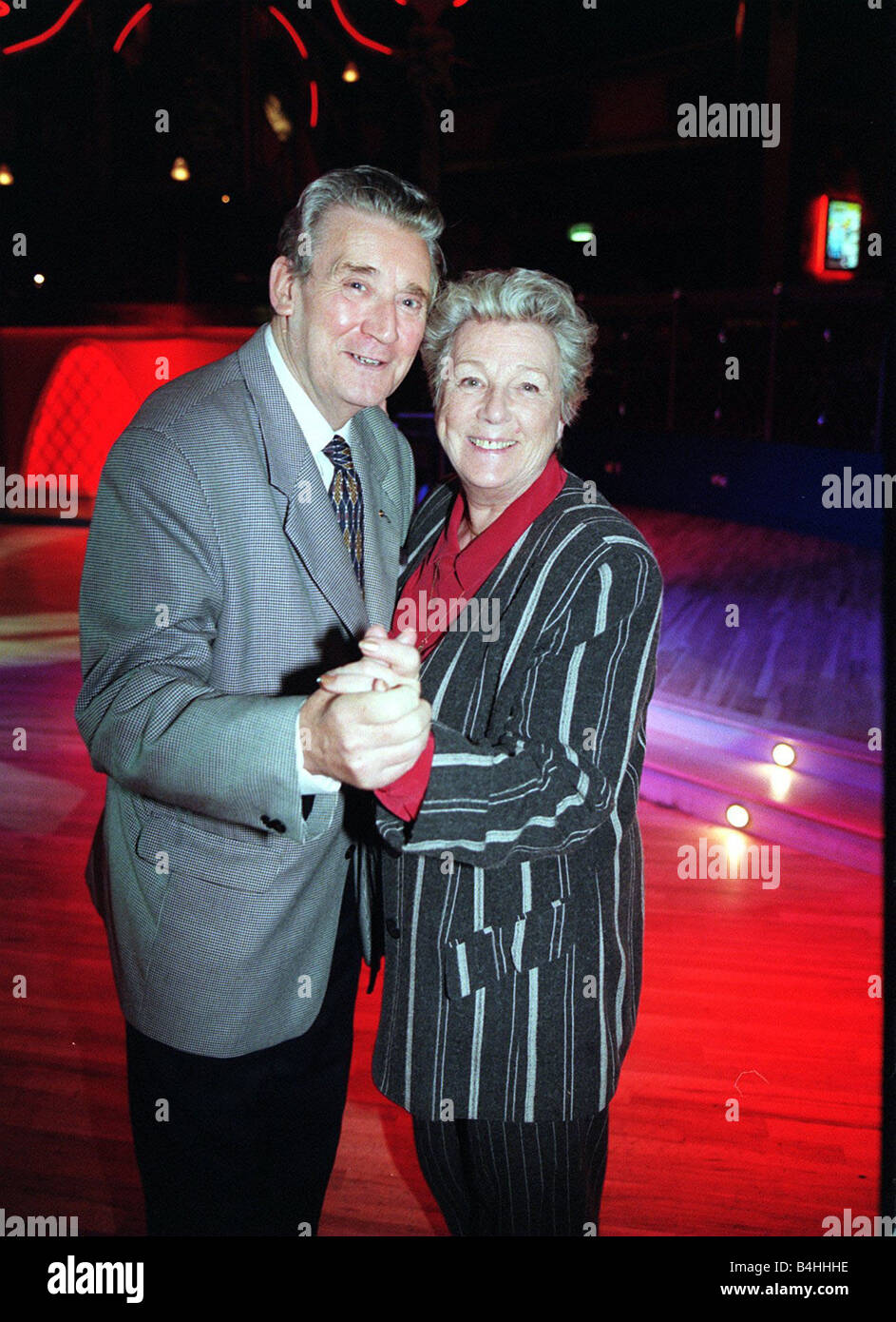 Bryan Mosley actor December 1998 dancing with wife Norma at a Christmas ...