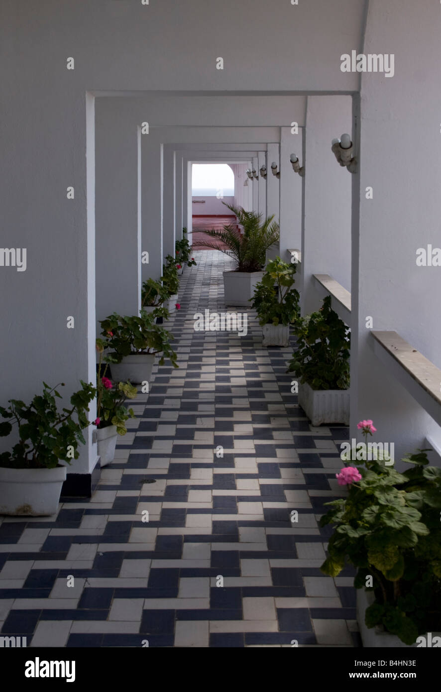Interesting corridor with paving Stock Photo - Alamy