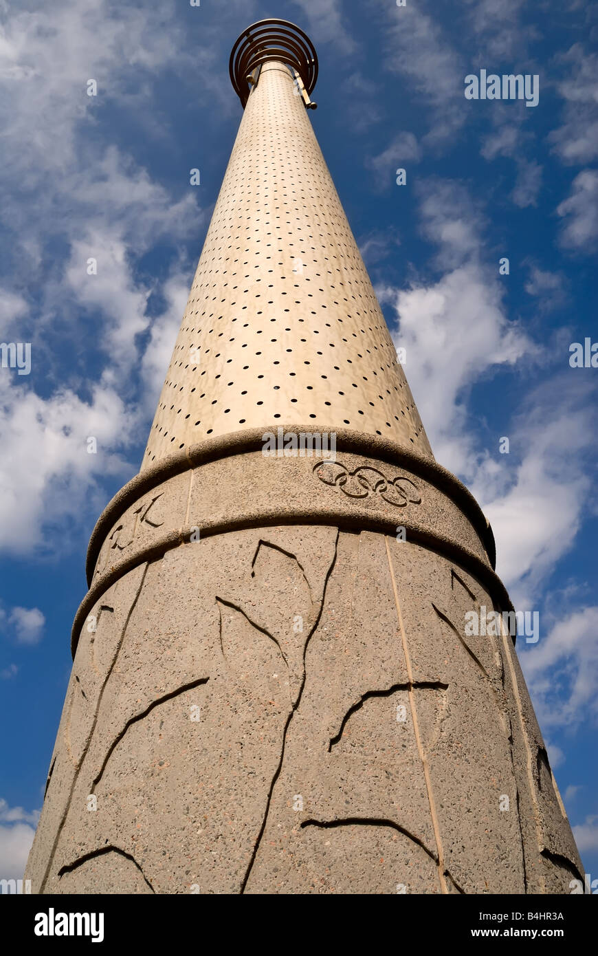 A steep angled view of a towering Olympic torch in Centenial Olympic ...